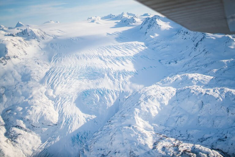 Flying Over Glaciers on a Scenic Plane Tour in Alaska - Wander The Map
