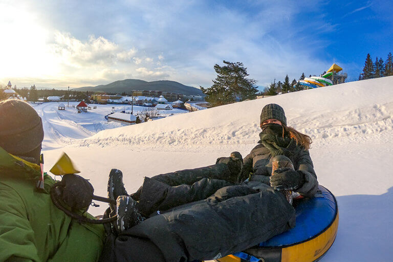 Sliding into Winter: Snow Tubing and Waterslides in Quebec - Wander The Map