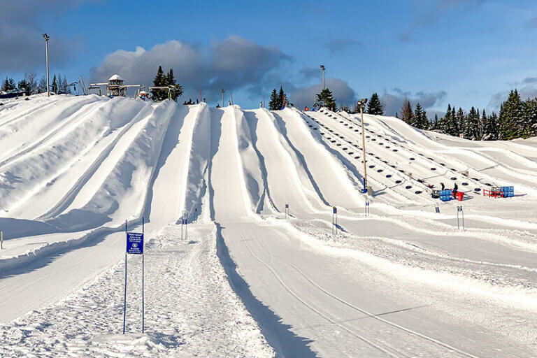 Sliding into Winter: Snow Tubing and Waterslides in Quebec - Wander The Map