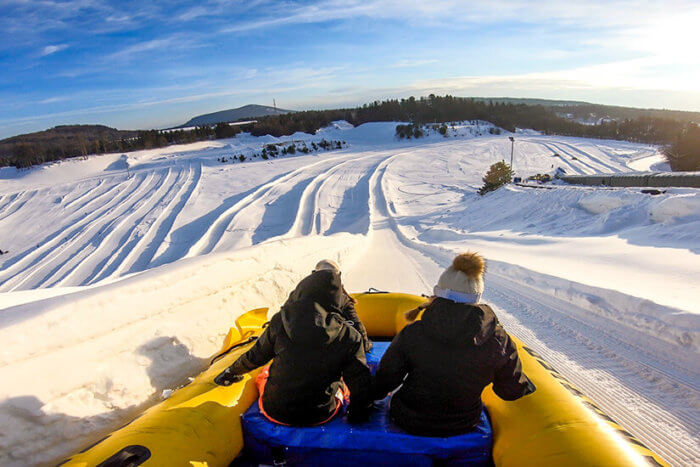 Sliding into Winter: Snow Tubing and Waterslides in Quebec - Wander The Map